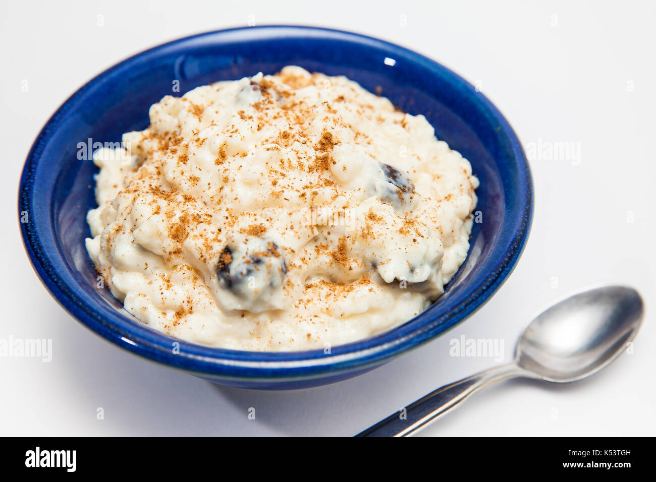 Rice Pudding with cinamon and raisins preparation : Ready served sweet ...