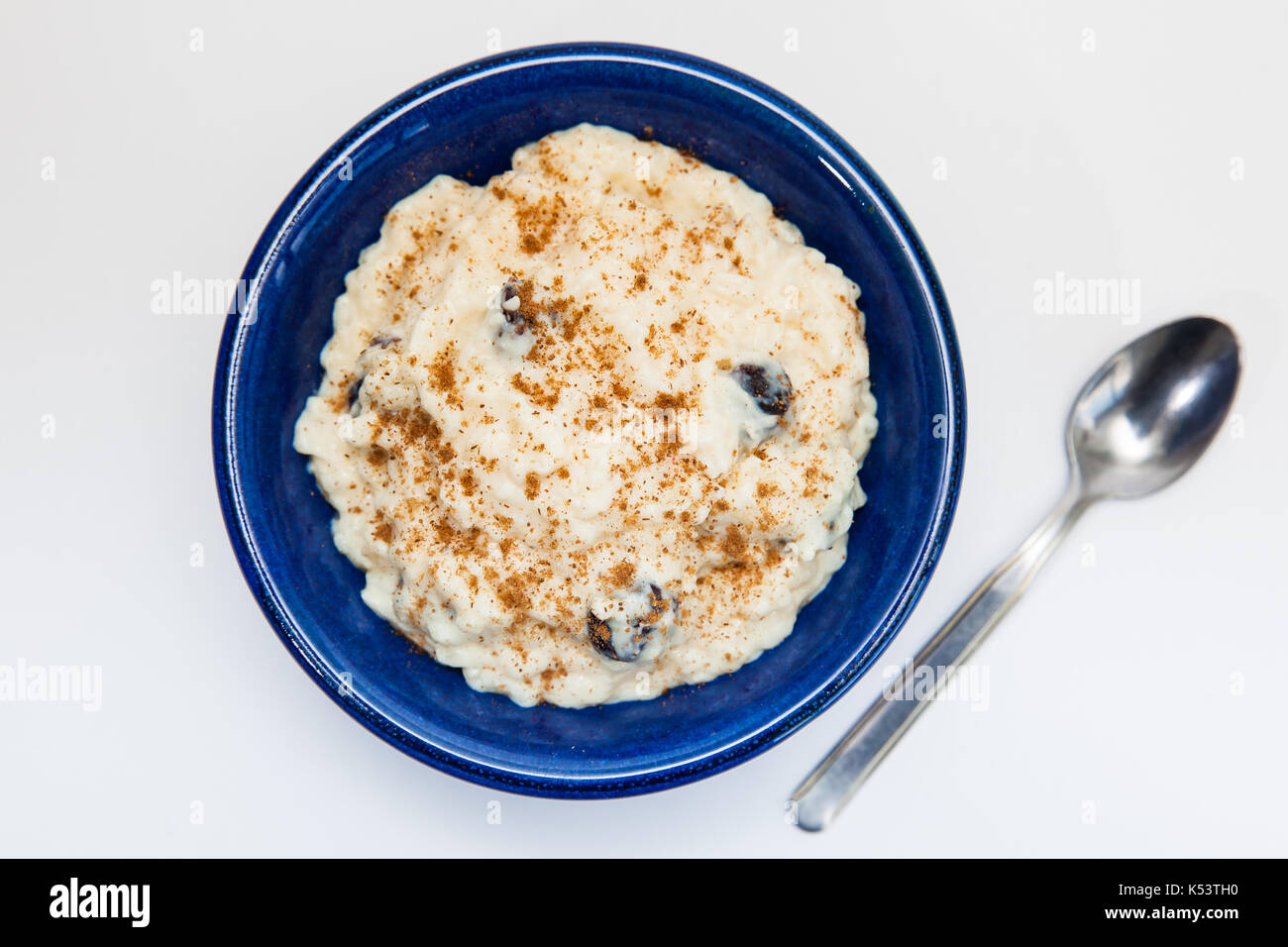 Rice Pudding with cinamon and raisins preparation : Ready served sweet ...