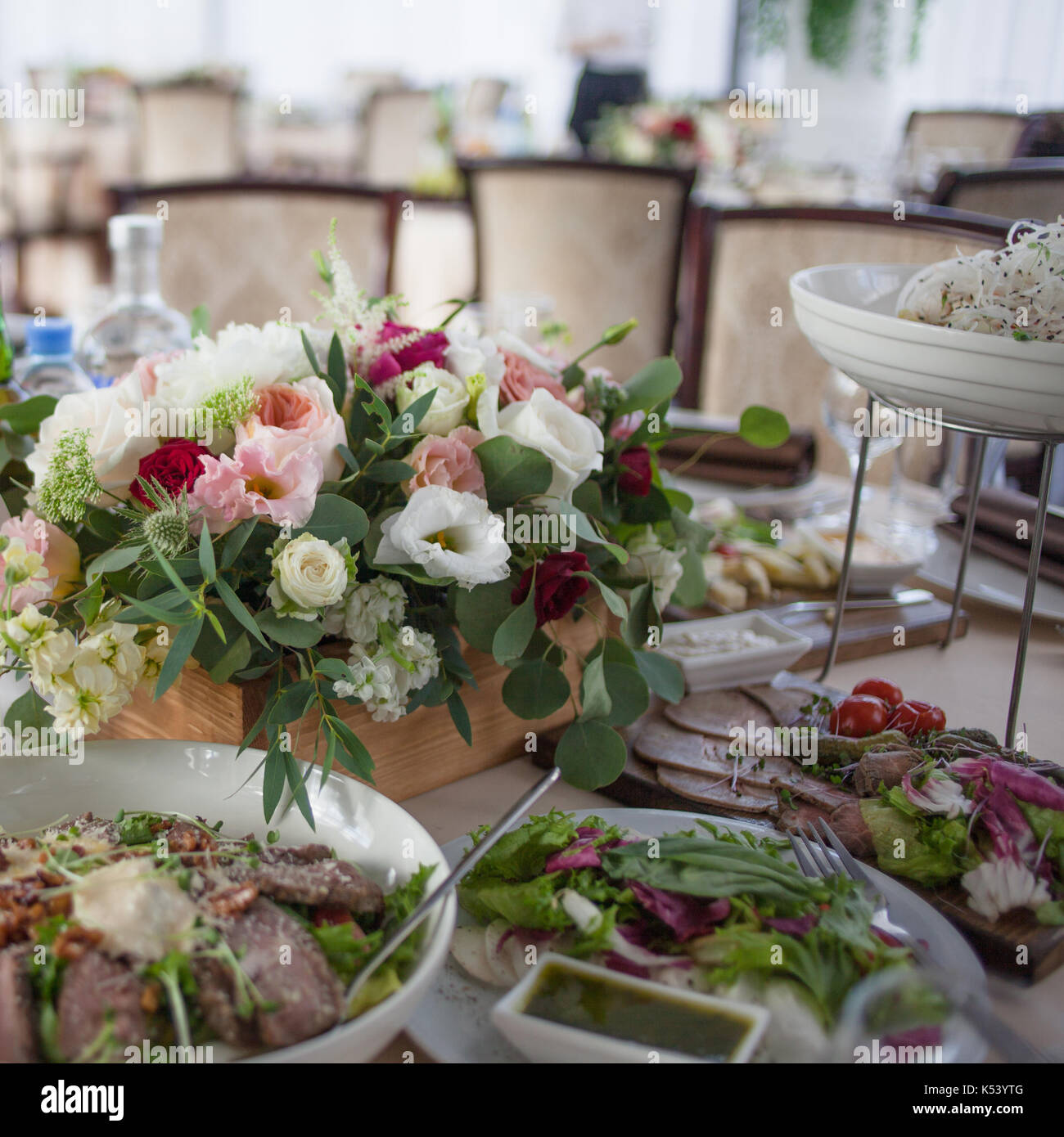 Wedding decor. The flowers in the restaurant, table setting Stock Photo ...