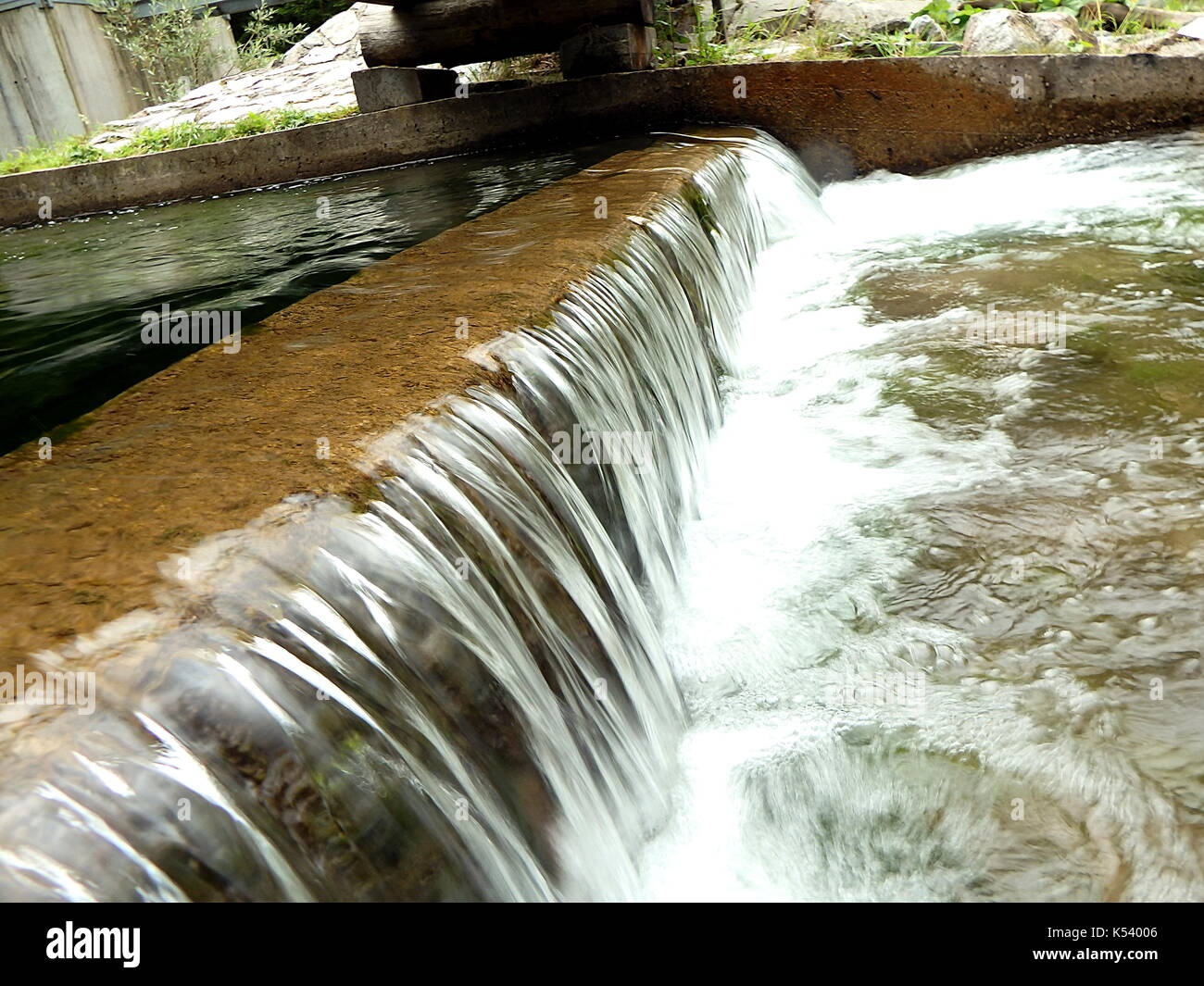 small waterfall, artificial cascade on the river Stock Photo - Alamy