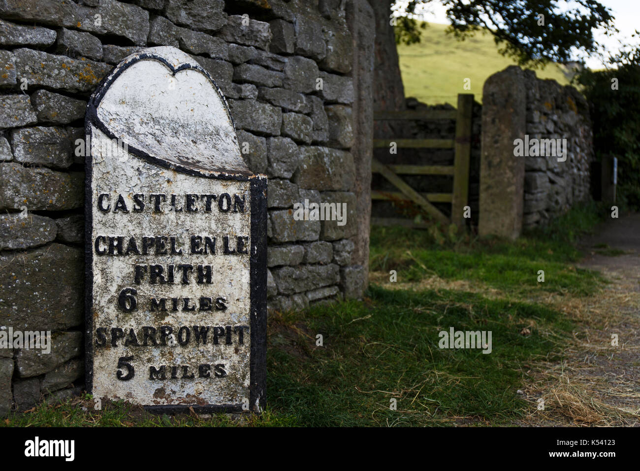 Old English milestone Stock Photo - Alamy