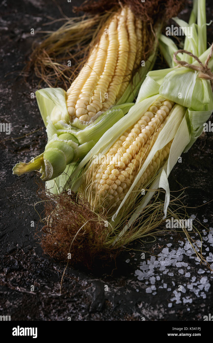 Young raw corn cobs Stock Photo - Alamy