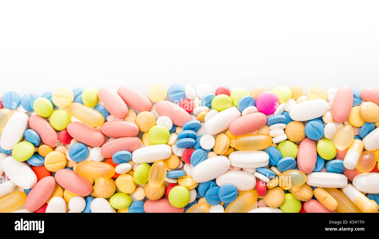 pills border. Multicoloured medical pills Stock Photo - Alamy