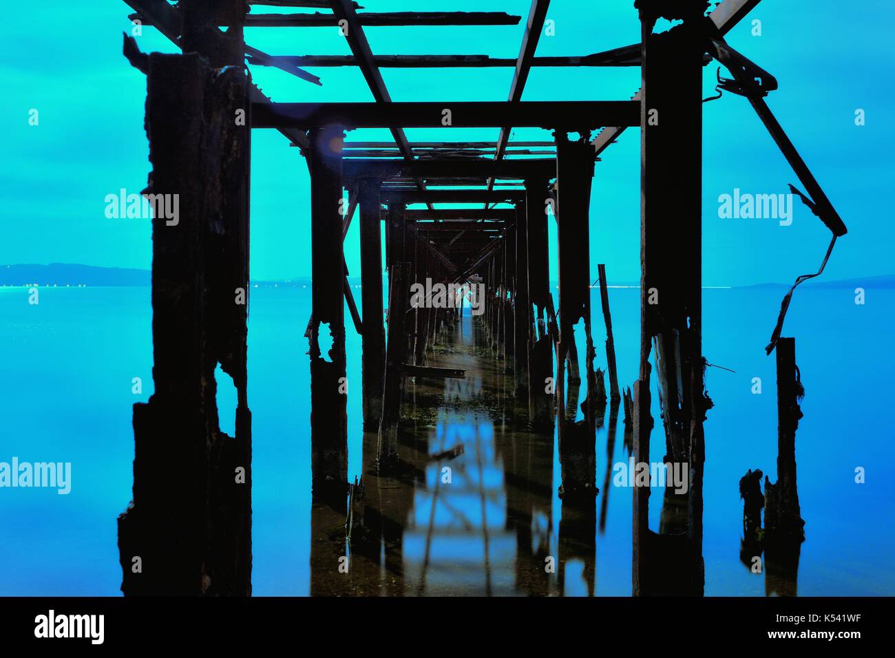 Rust in blue sea Stock Photo - Alamy