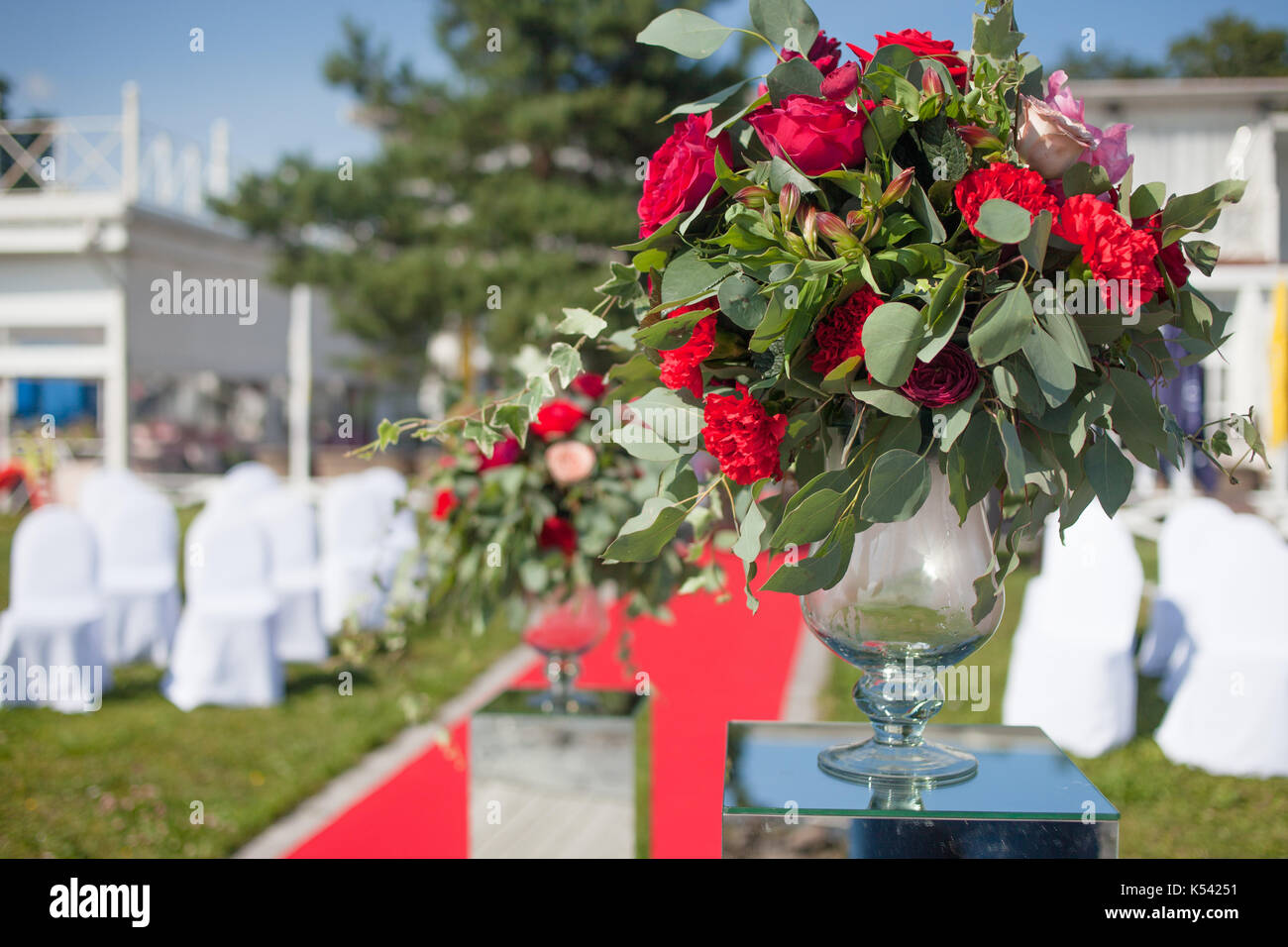 Wedding registration outdoor. Luxury bouquets with red flowers Stock ...