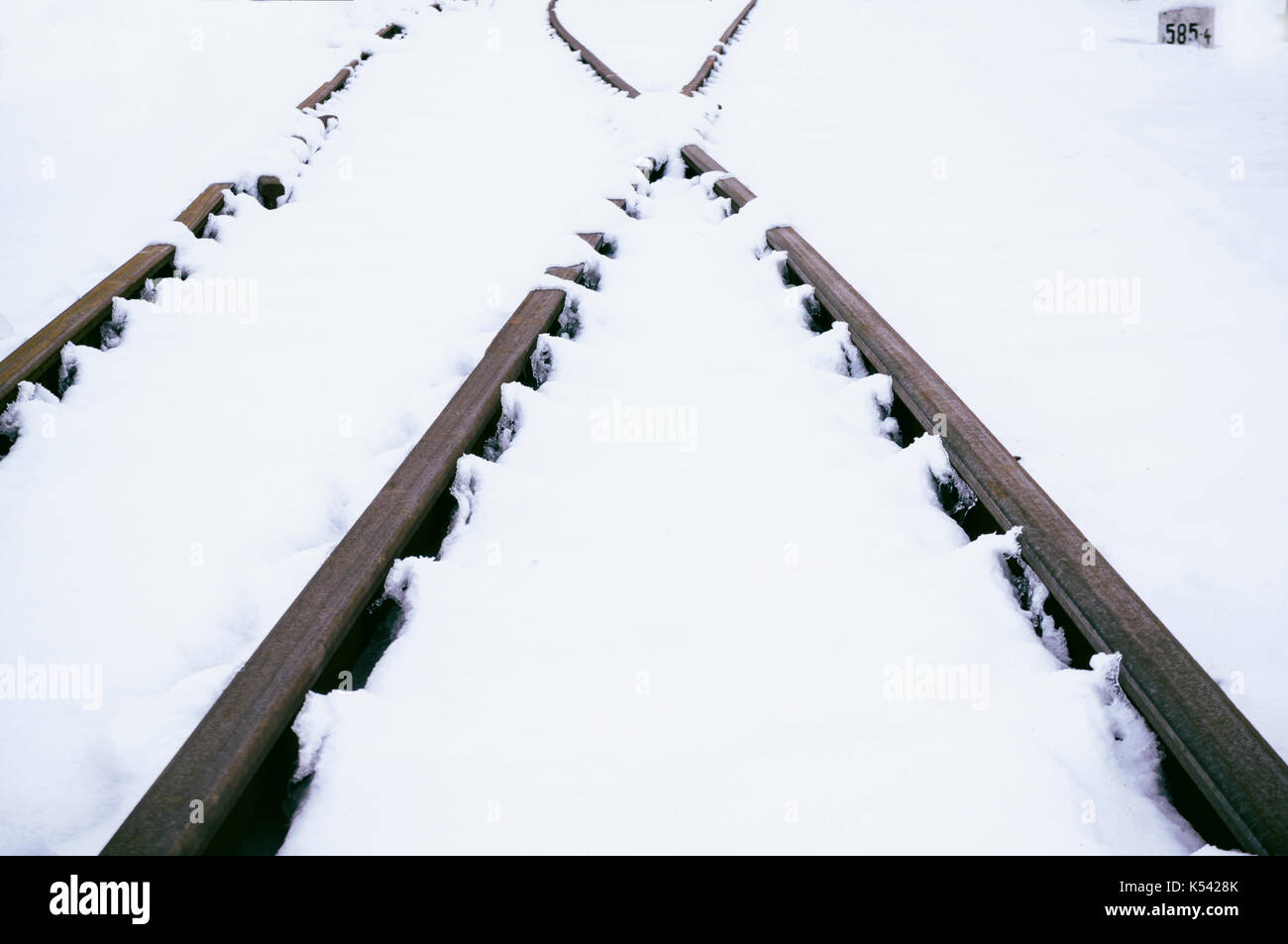 Railroad tracks in snow Stock Photo - Alamy