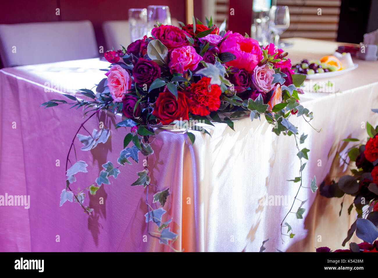 Wedding decor. The flowers in the restaurant, table setting Stock Photo ...