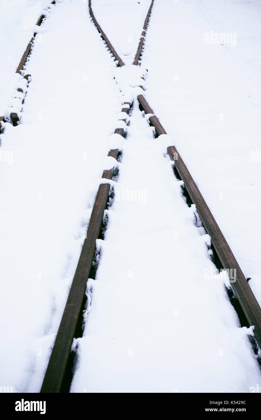 Railroad tracks in snow Stock Photo - Alamy