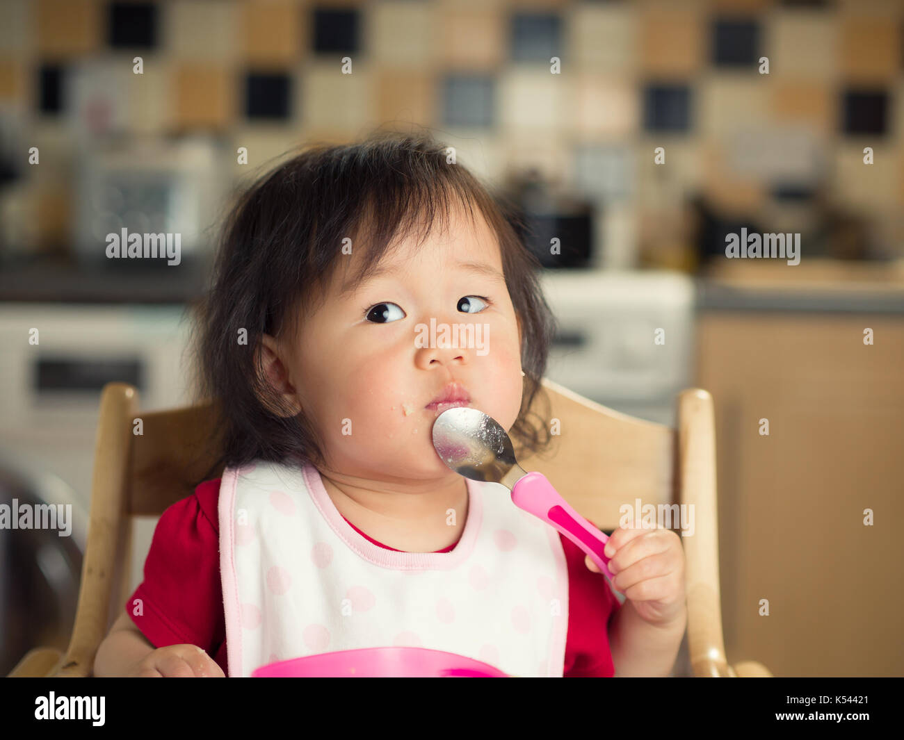 Kid eating beans hi-res stock photography and images - Alamy