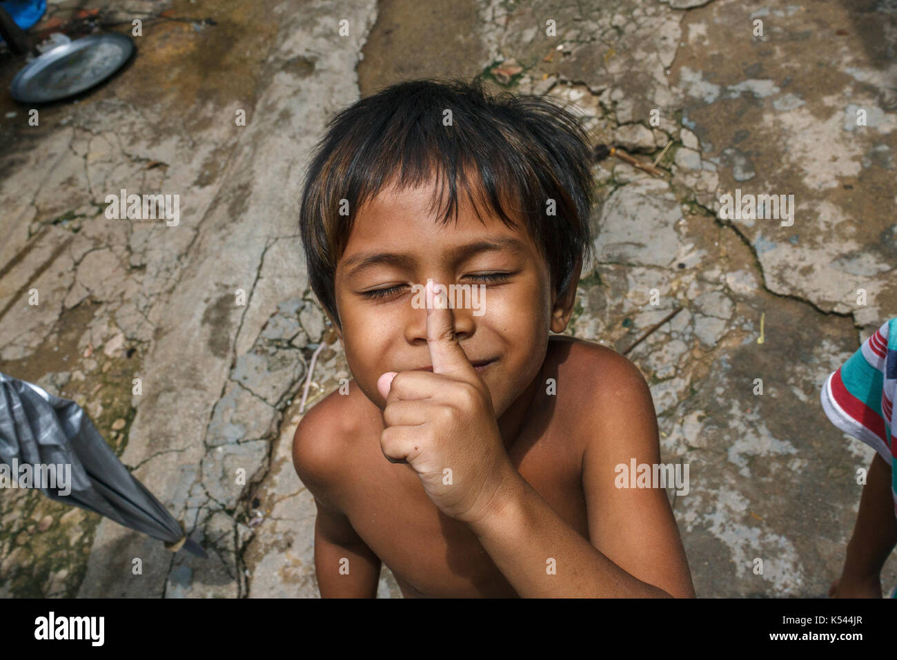 Poor boy portrait cambodia hi-res stock photography and images - Alamy