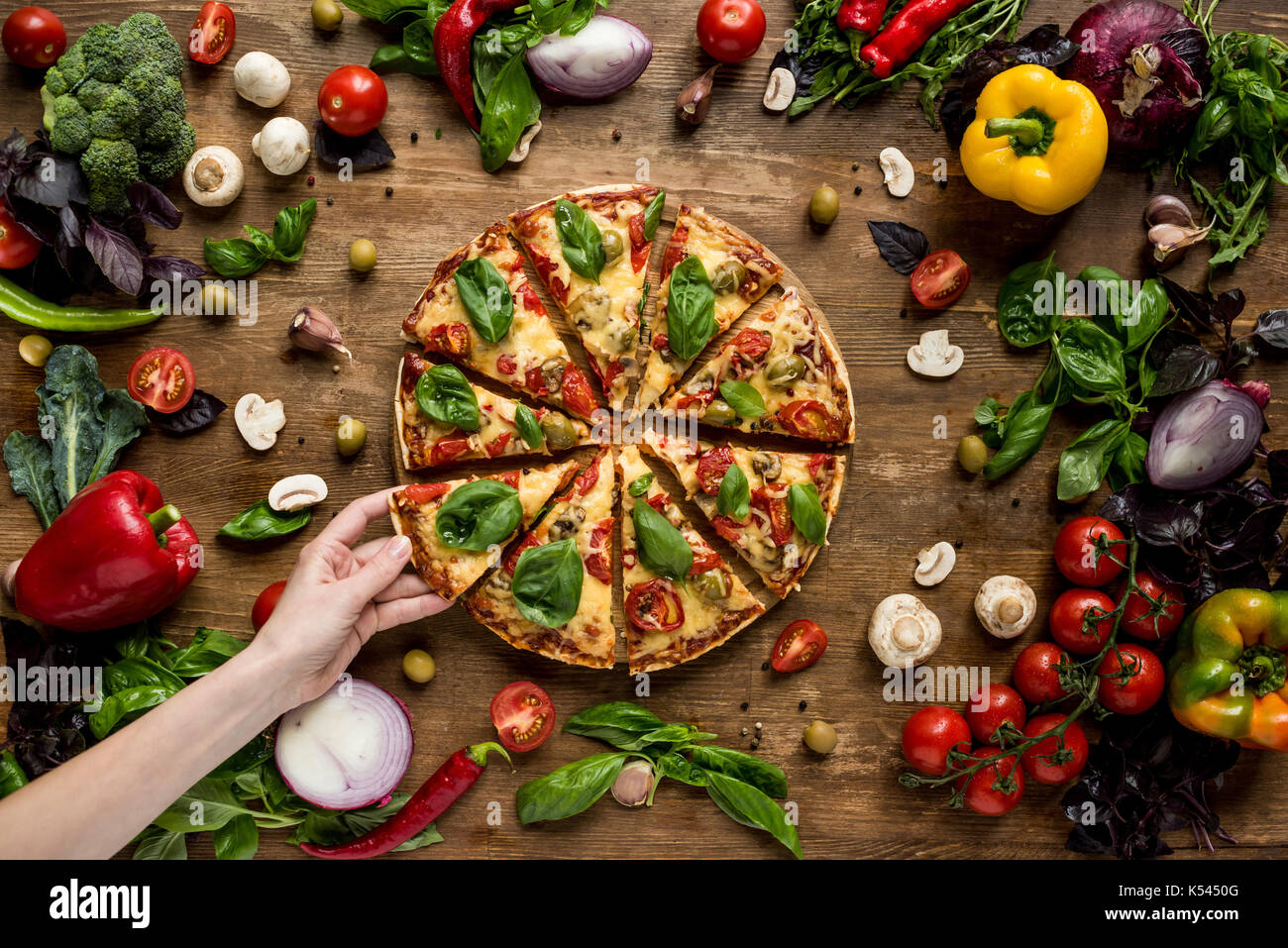 Woman hand taking slices delicious hi-res stock photography and images ...