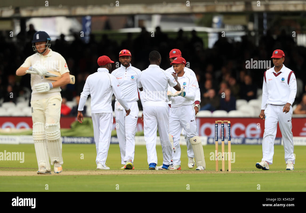 West Indies Kemar Roach (centre, back to camera) celebrates dismissing ...