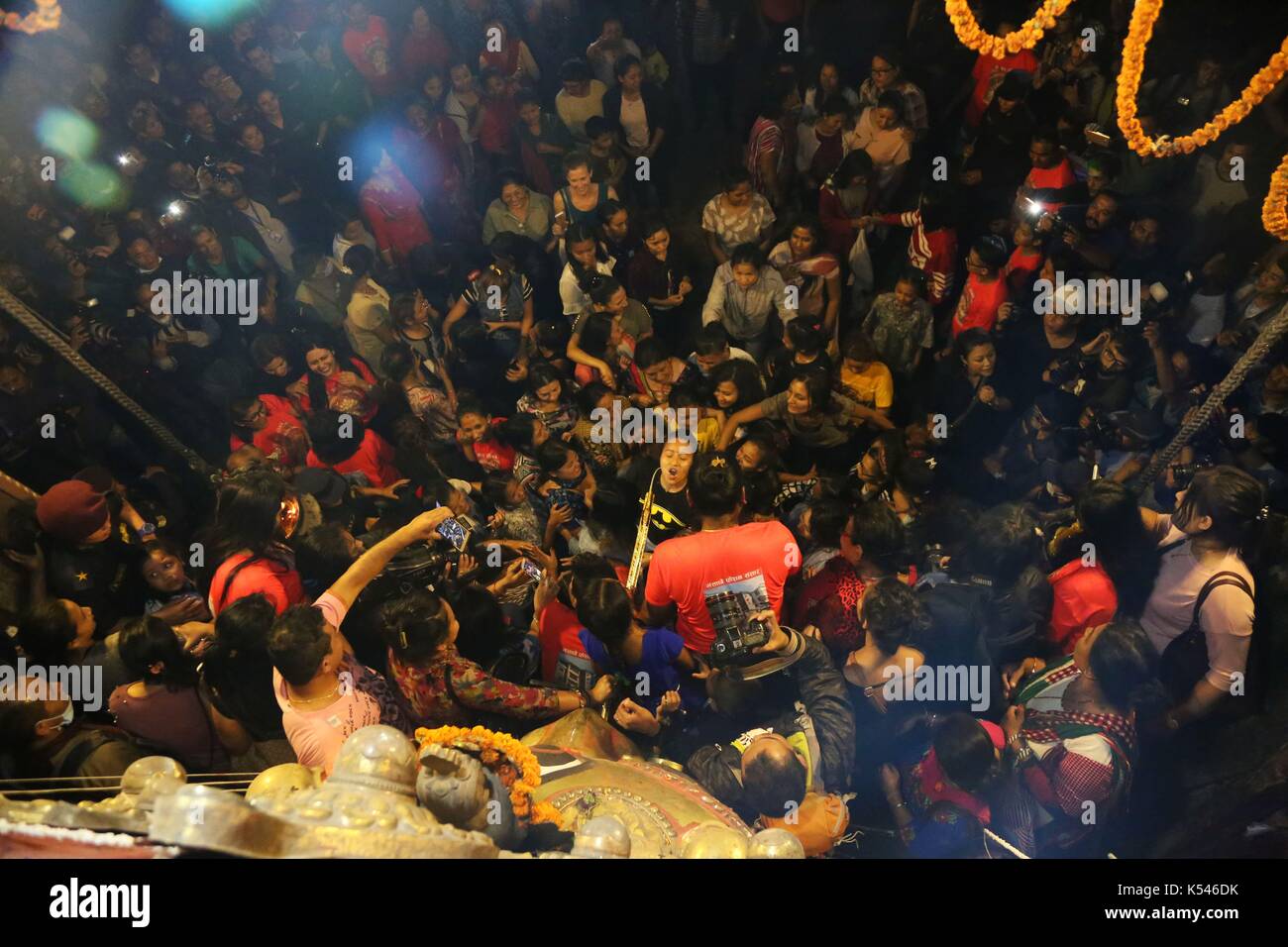 Kathmandu, Nepal. 07th Sep, 2017. Nepalese struggle to drink homemade ...