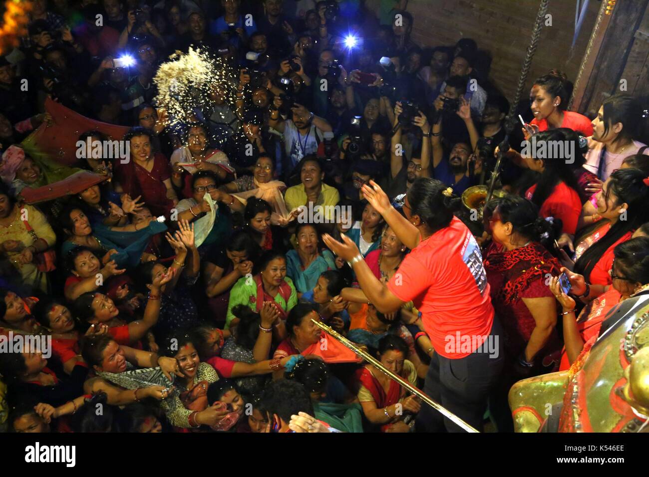 Kathmandu, Nepal. 07th Sep, 2017. Nepalese struggle to drink homemade ...