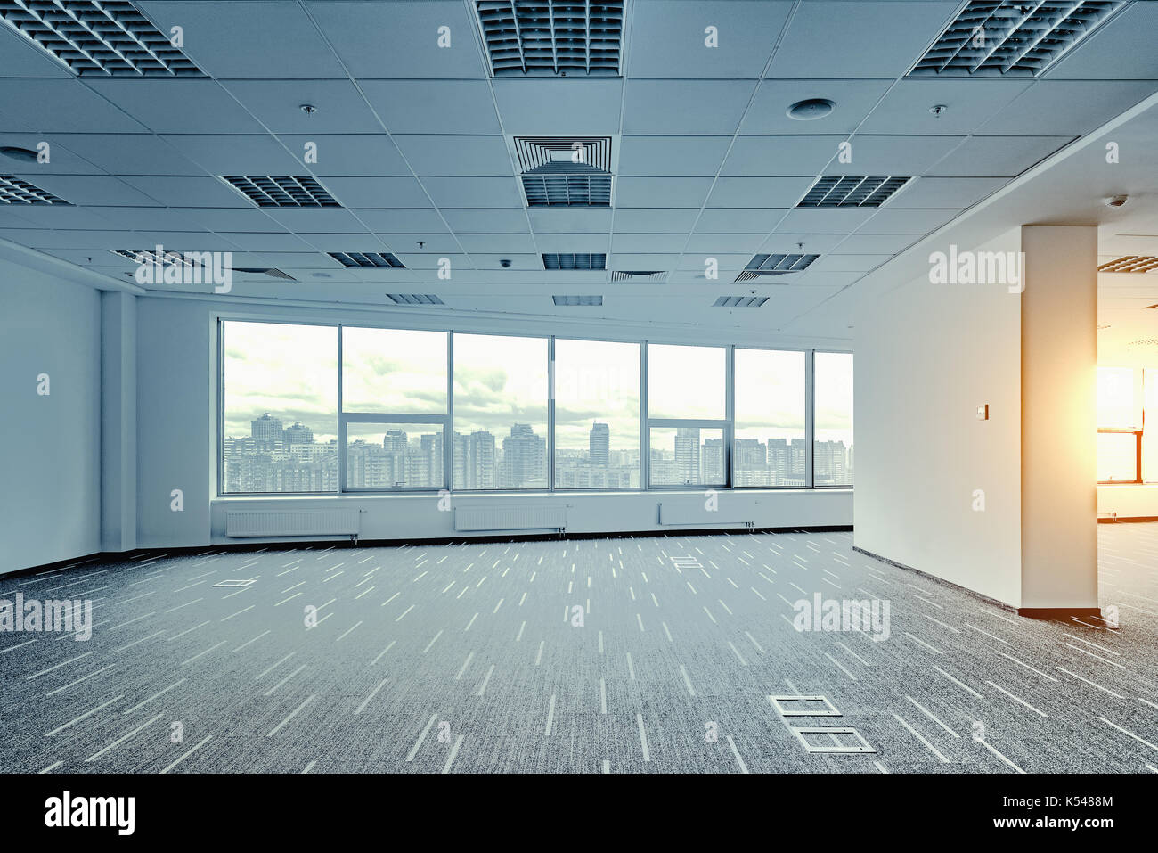 Interior of the new empty office building at sunset time Stock Photo ...