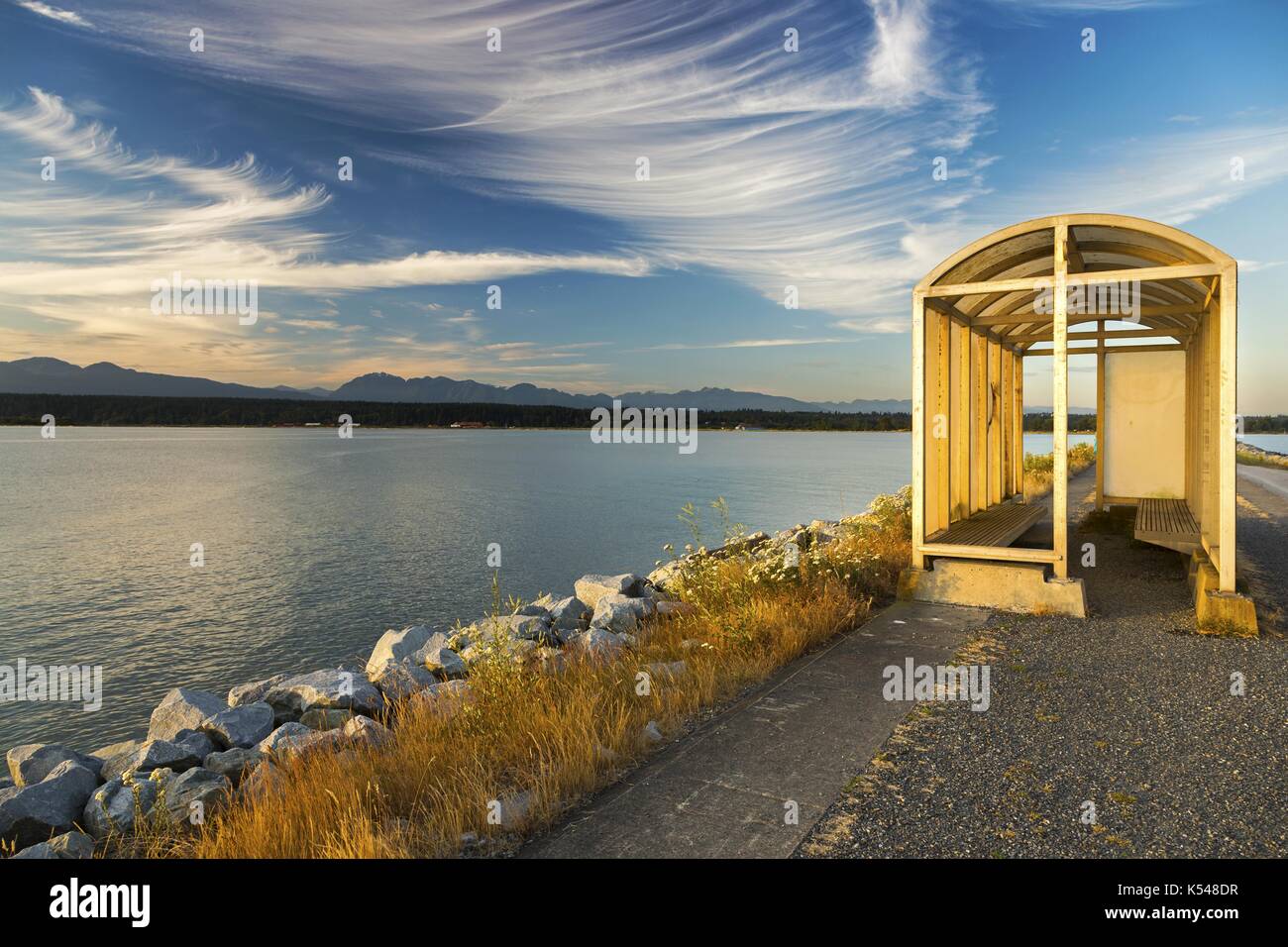 Wind Storm Shelter on Walking Path on Iona Jetty Pier with distant view ...