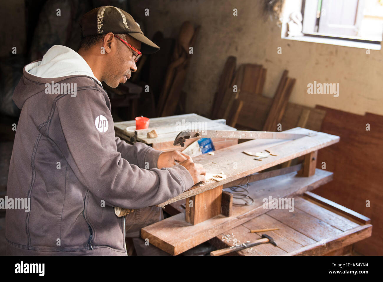 Traditional Zafimaniry wood carver at work, Ambositra, Madagascar Stock ...