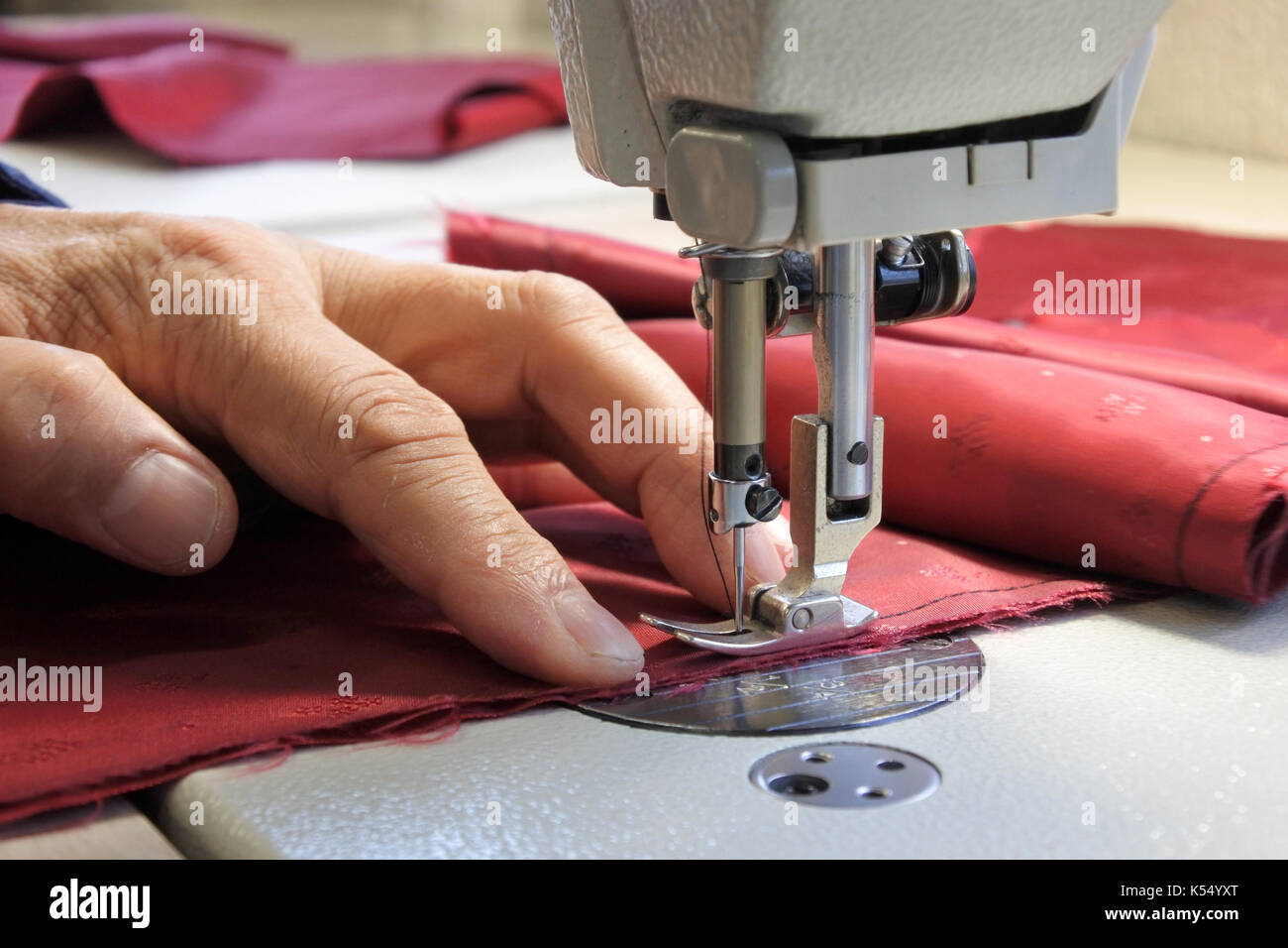 Tailors Hands High Resolution Stock Photography and Images - Alamy