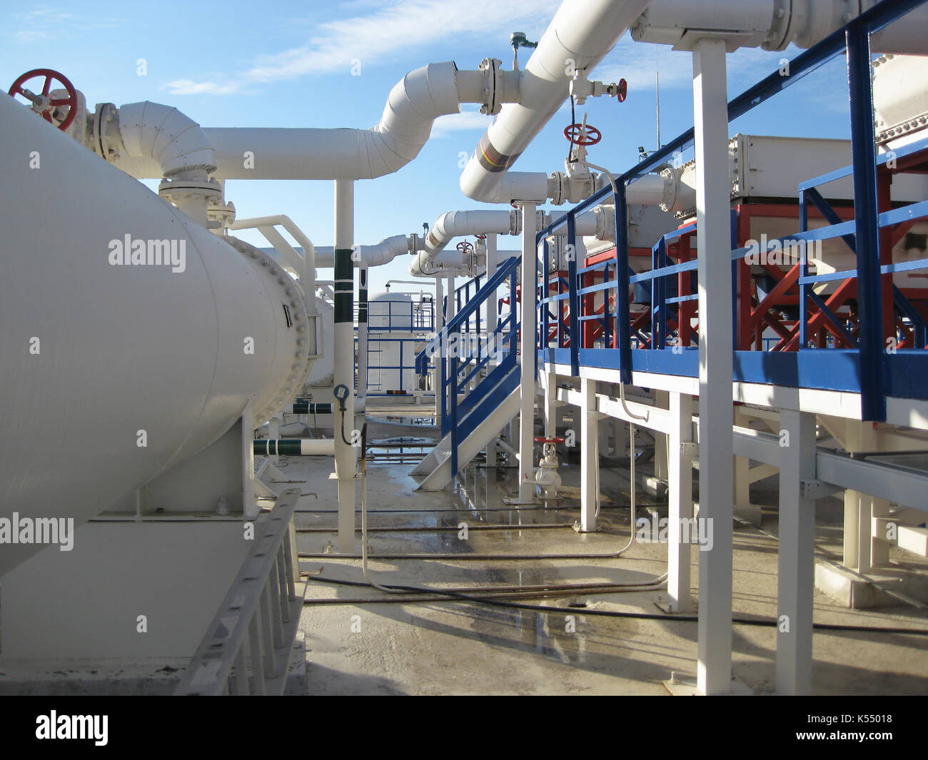 Steel service platform and stairs. Equipment refinery Stock Photo - Alamy