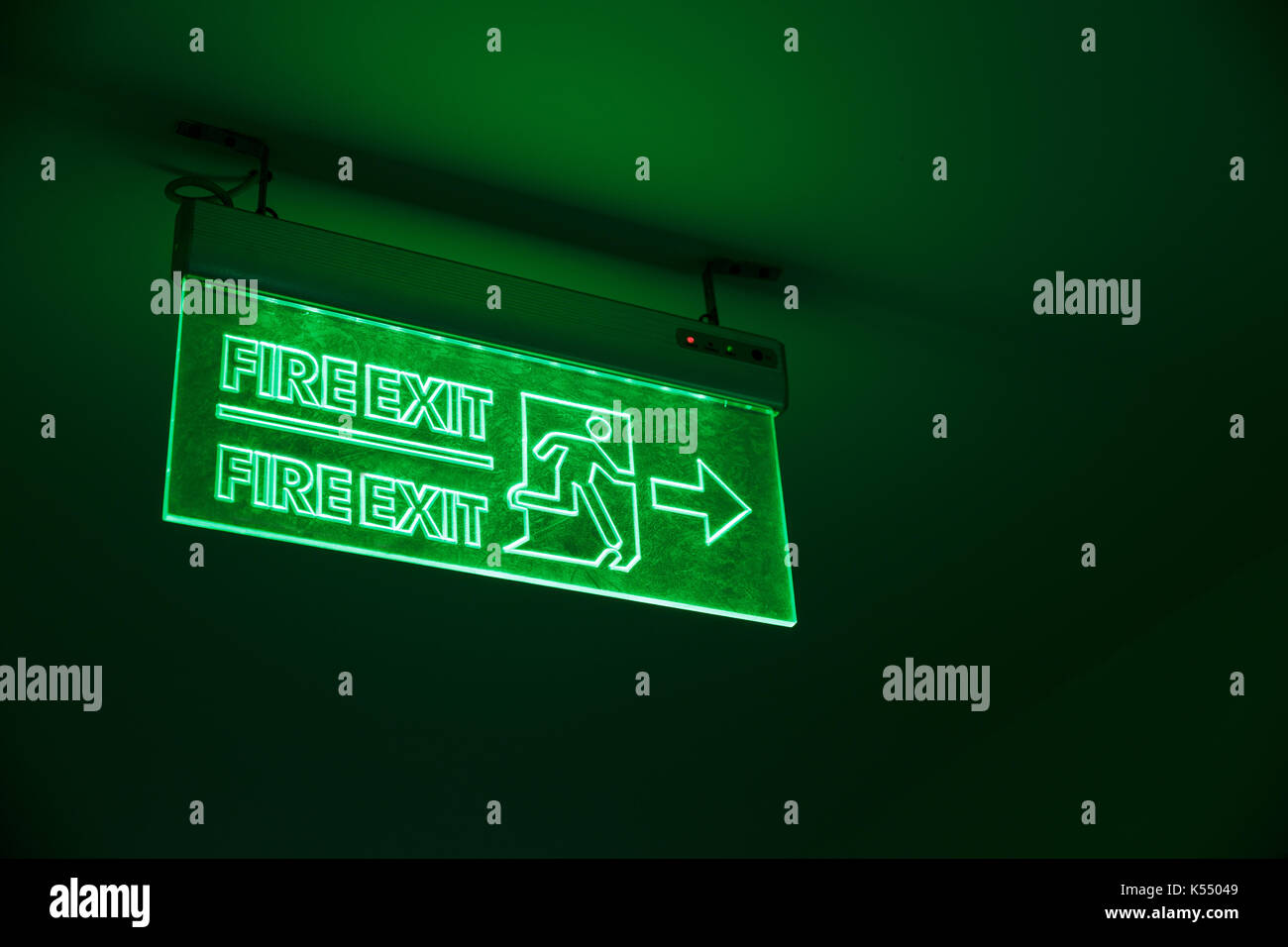 Green light Exit sign. Emergency Way out light sing in the Building ...