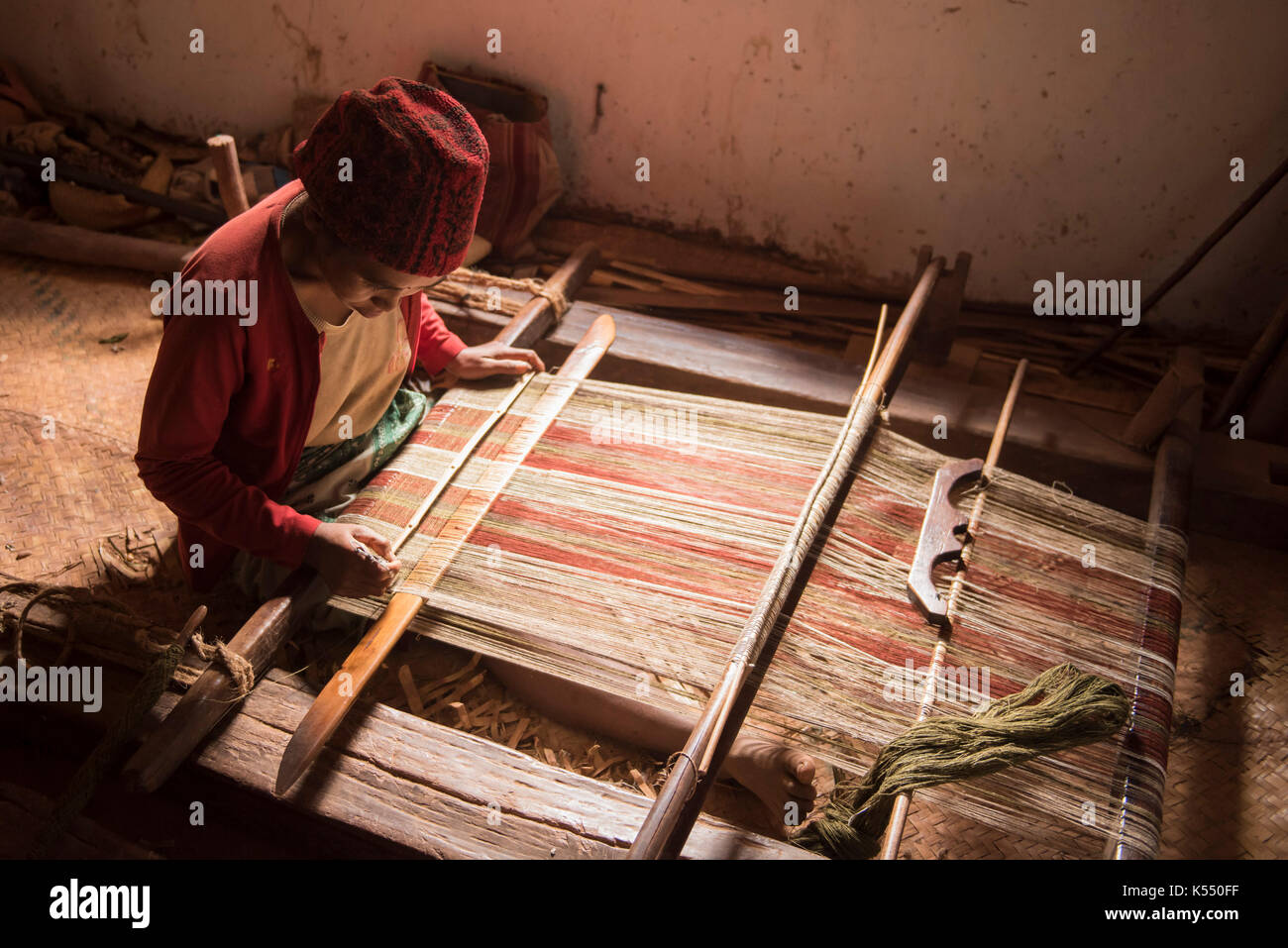 Silk weaver at work, Soatanana silk village, Madagascar Stock Photo - Alamy