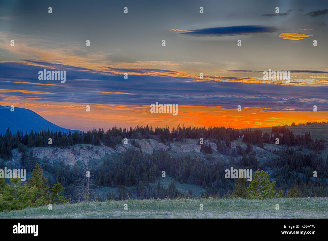 The sun sets over the Pryor Mountain Mustang range near Lovell, Wyoming ...