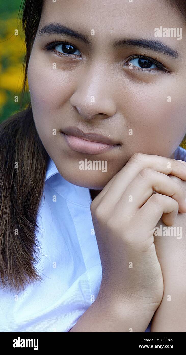 Cute Female And Shyness Stock Photo - Alamy