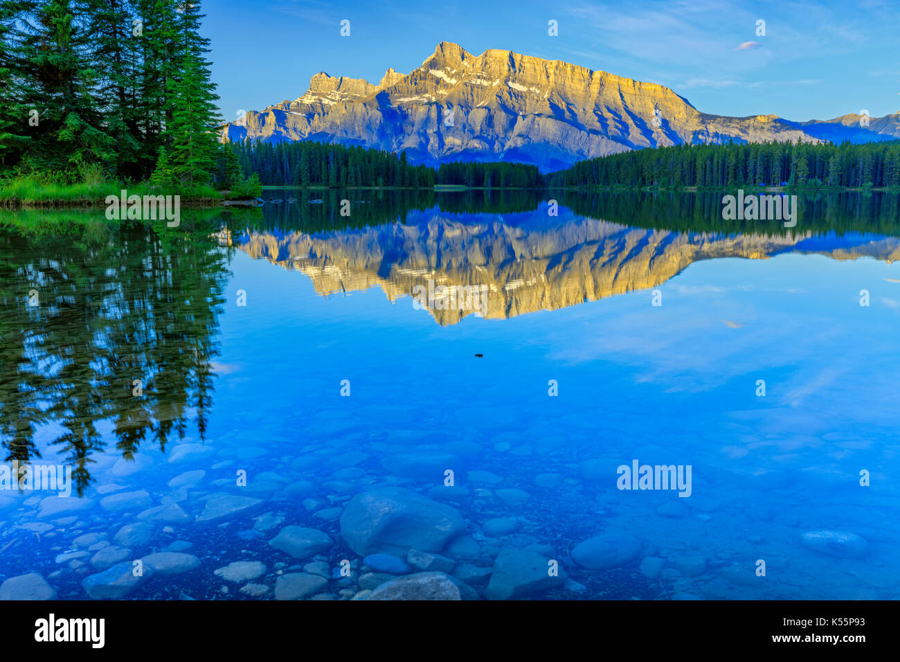 Mount Rundle reflecting in Two Jack Lake in Banff National Park ...