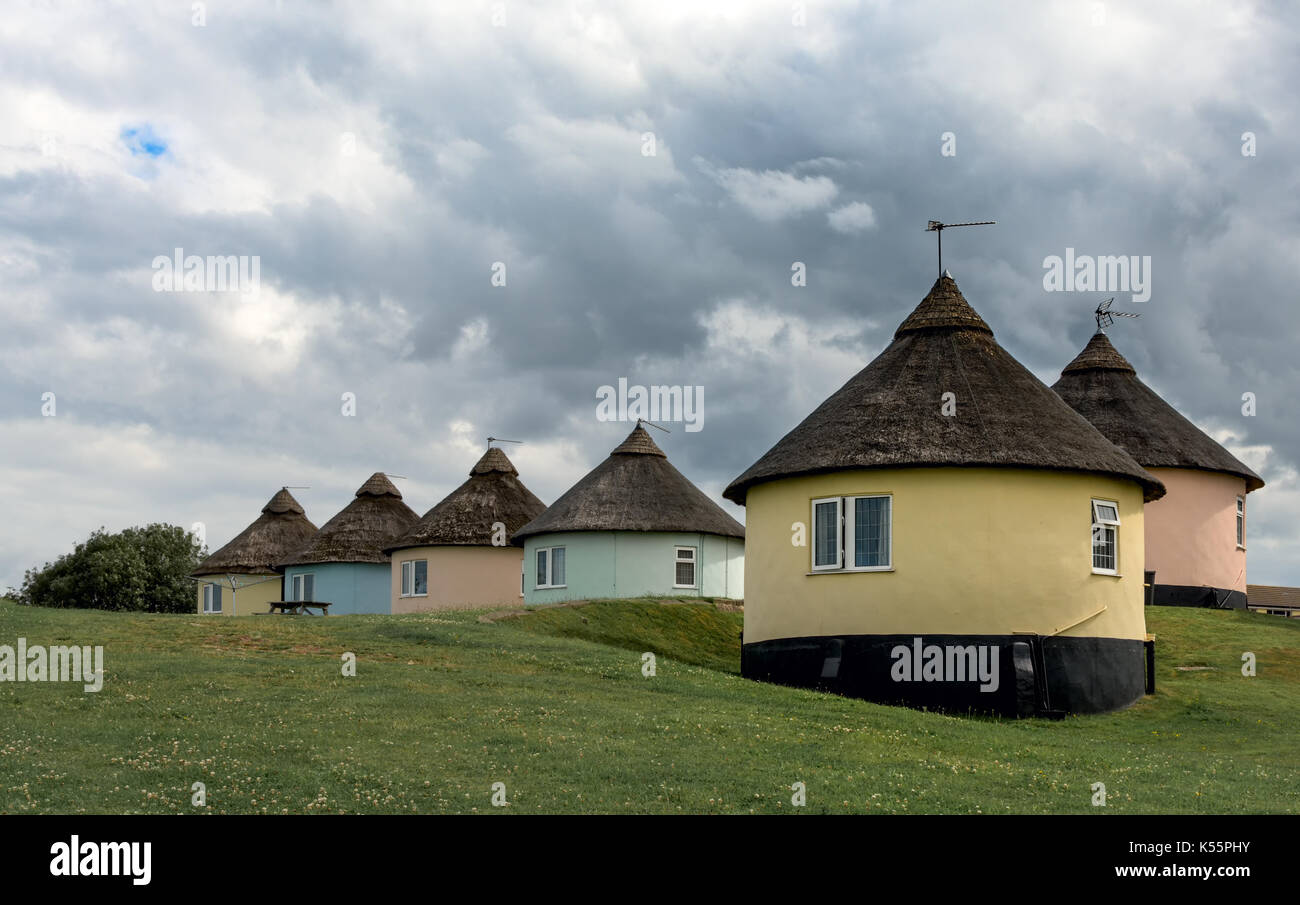 Winterton thatched round chalets Stock Photo - Alamy