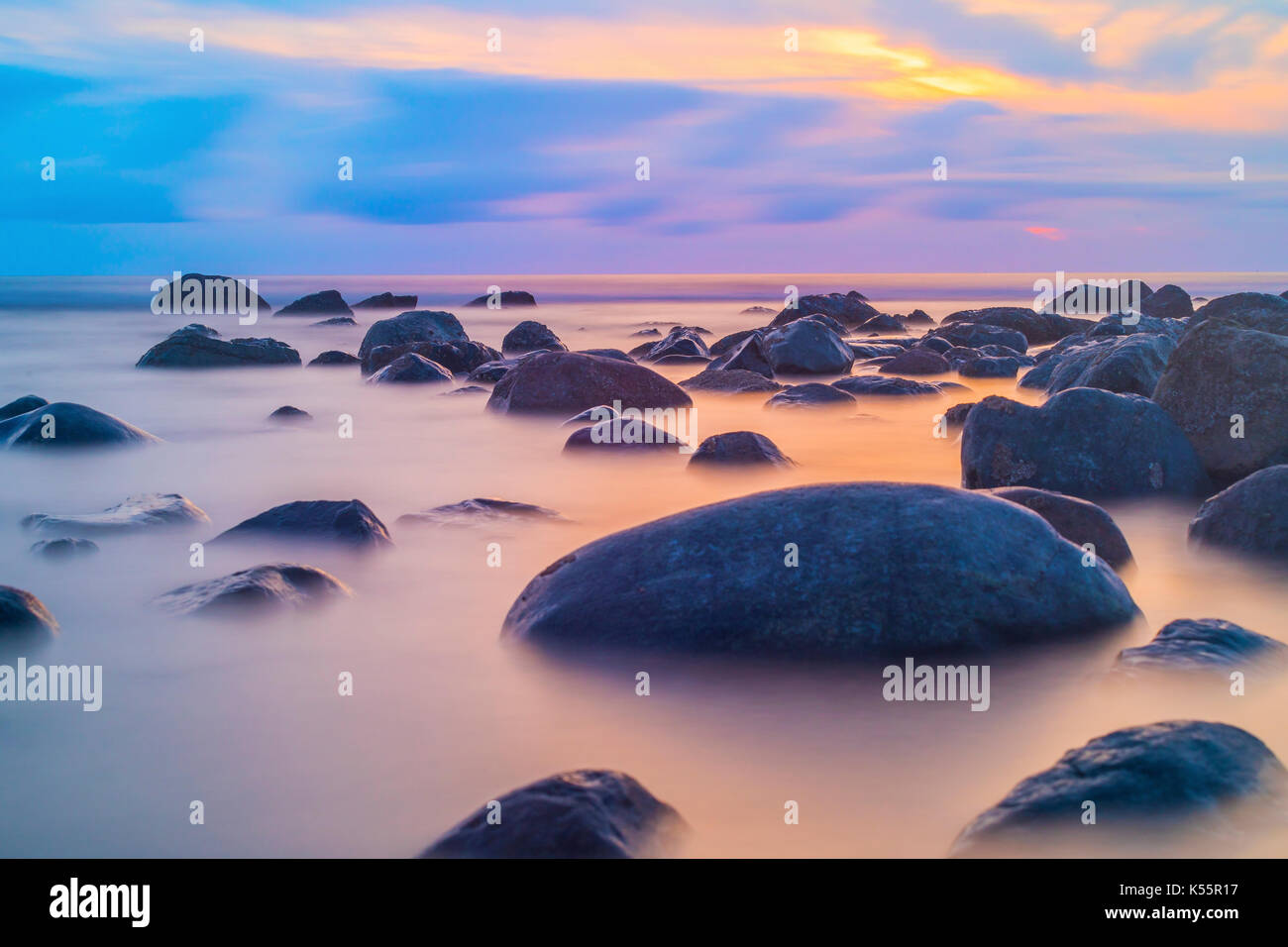 Beautiful seascape background, rocks in the Irish Sea at Seascale beach ...