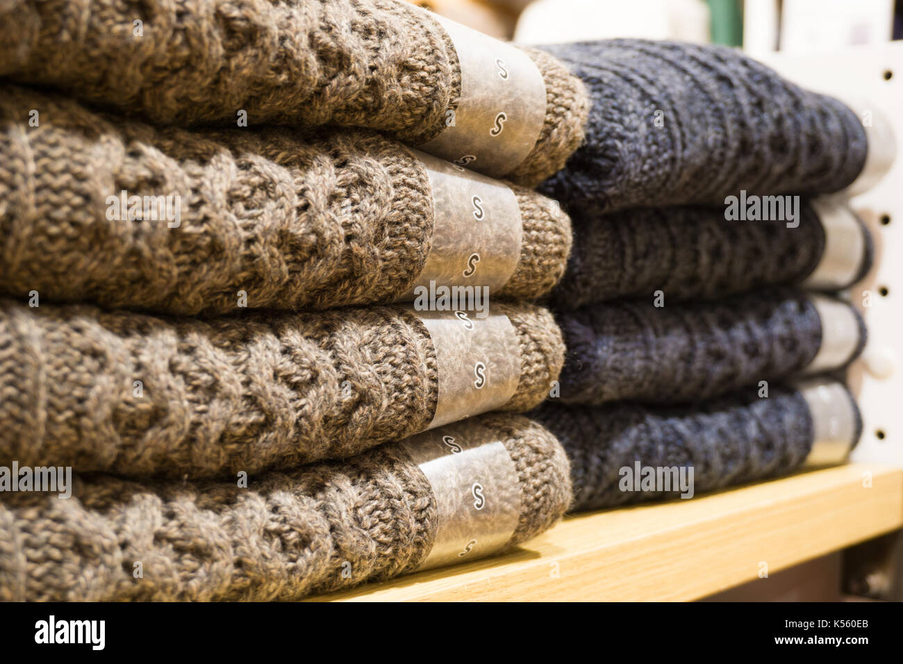 Stack folded warm sweaters hi-res stock photography and images - Alamy