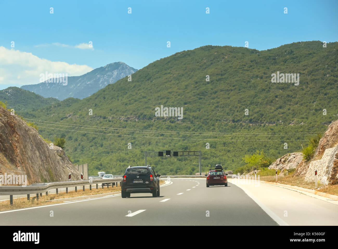 VLAKA, CROATIA - JULY 16, 2017 : A car driving on a highway through the ...