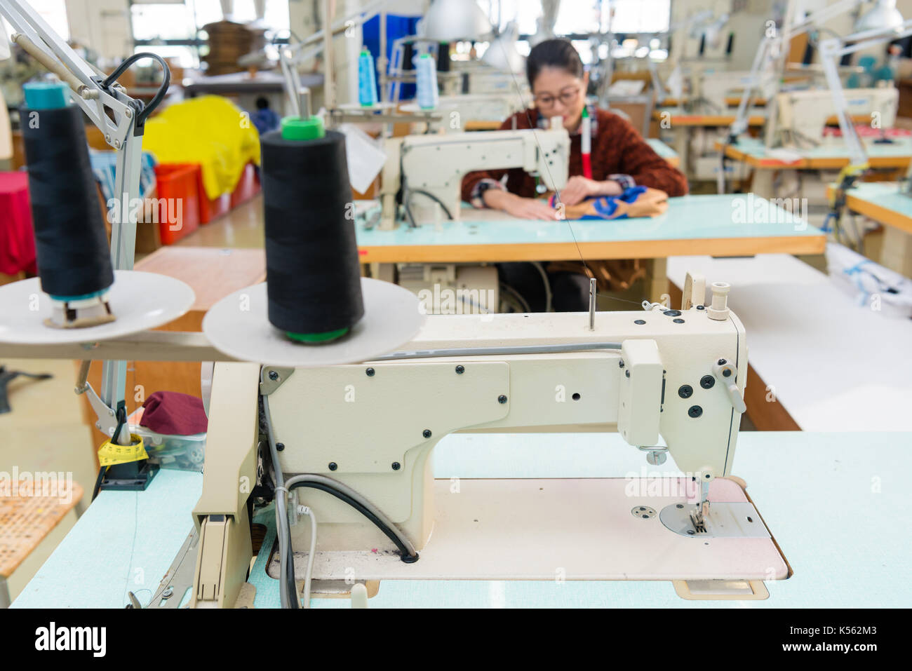 selective focus photo of fashion studio clothing sewing factory tailor ...