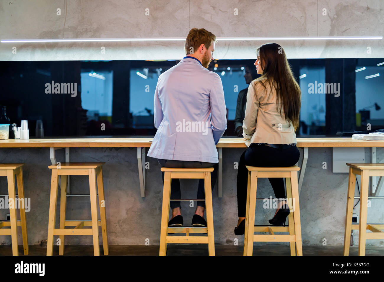 Dating couple in a bar Stock Photo - Alamy