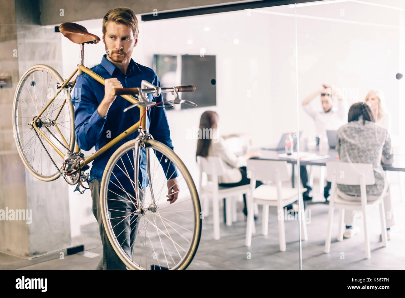 Using bicycle to go to work Stock Photo - Alamy