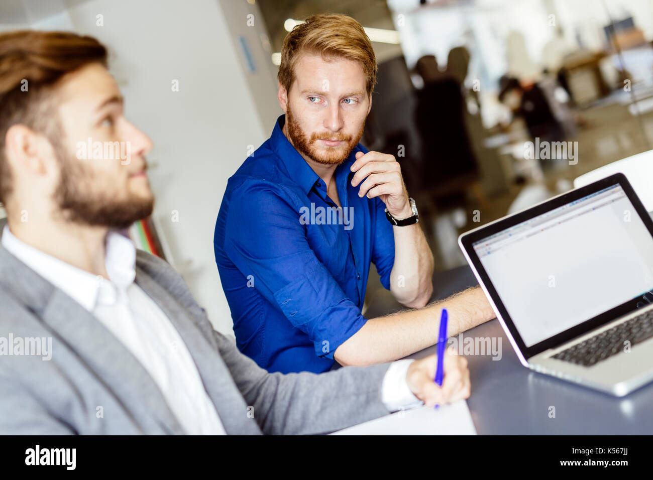 Office teamwork businessman laptop hi-res stock photography and images ...
