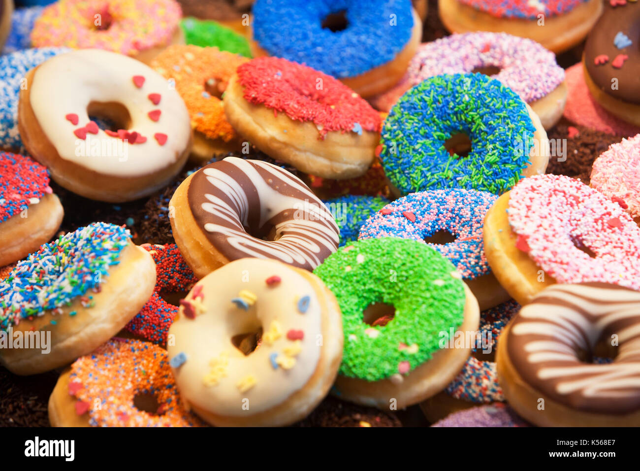 Colorful donuts with different decorations Stock Photo - Alamy