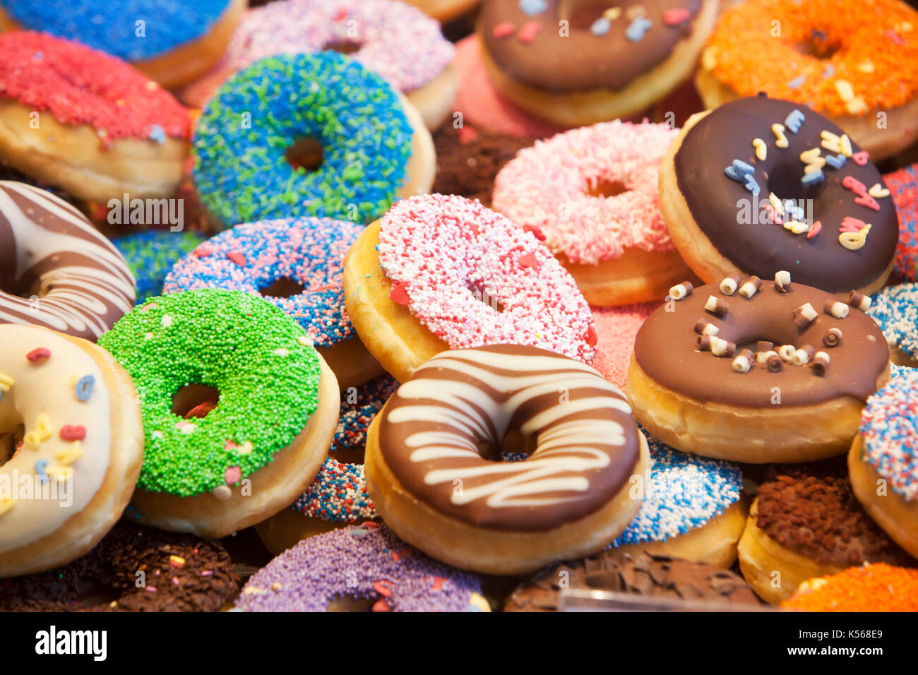 Colorful donuts with different decorations Stock Photo - Alamy