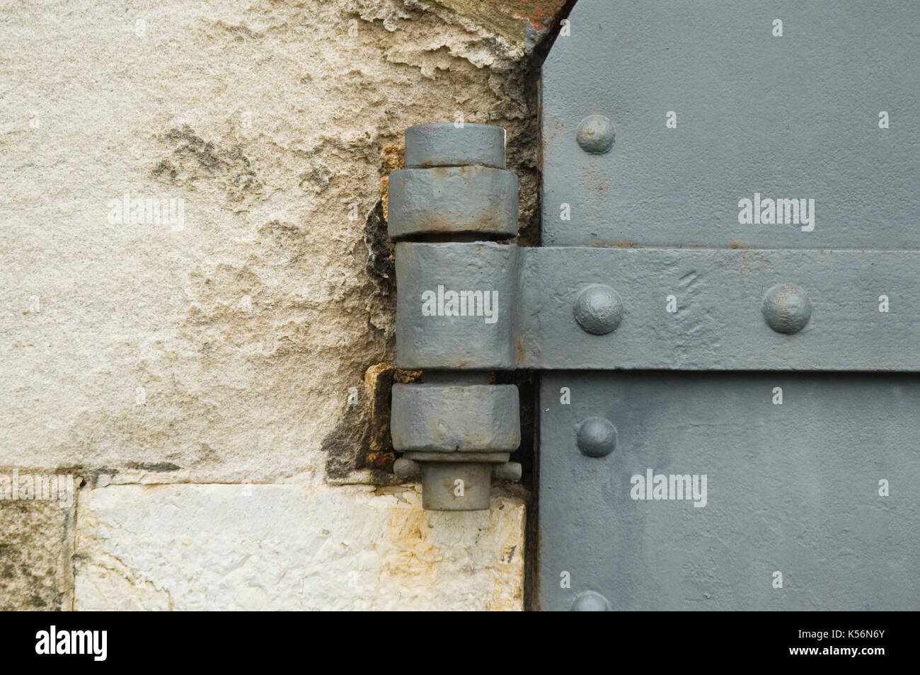 wrought-iron barrel hinge at a fortress of 19th century Stock Photo - Alamy