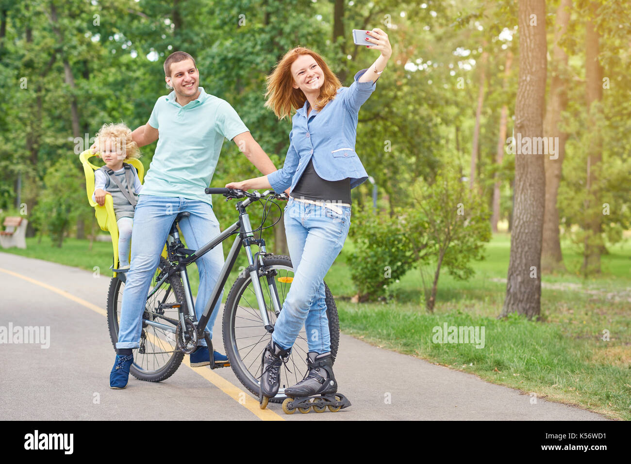 Children parents bike ride hi-res stock photography and images - Alamy