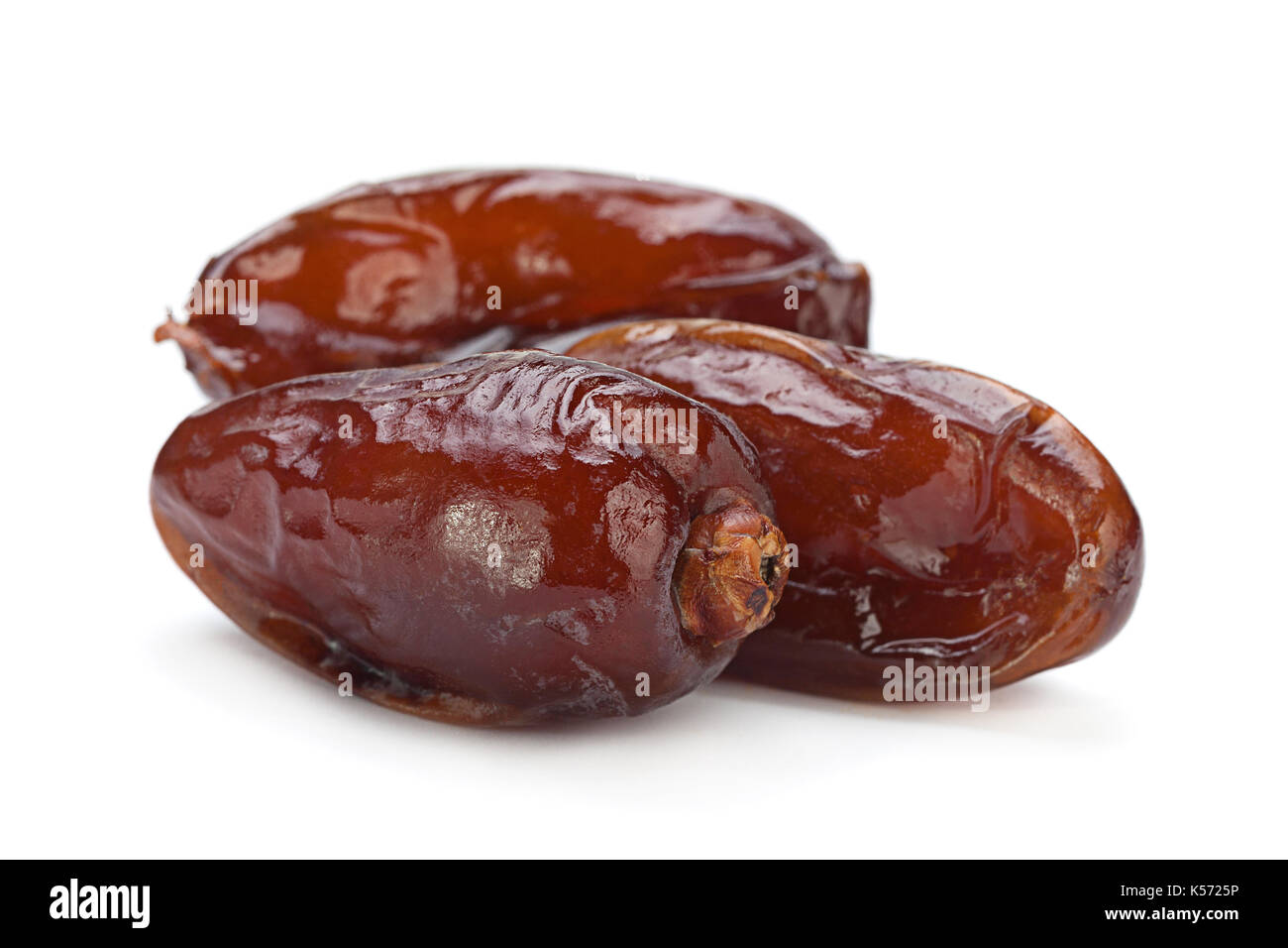 Sweet dried date fruit isolated on white background Stock Photo - Alamy