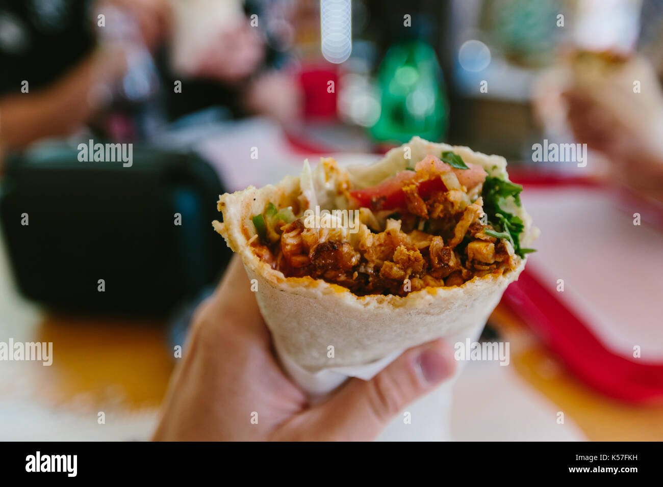 Shaurma in hand Stock Photo - Alamy
