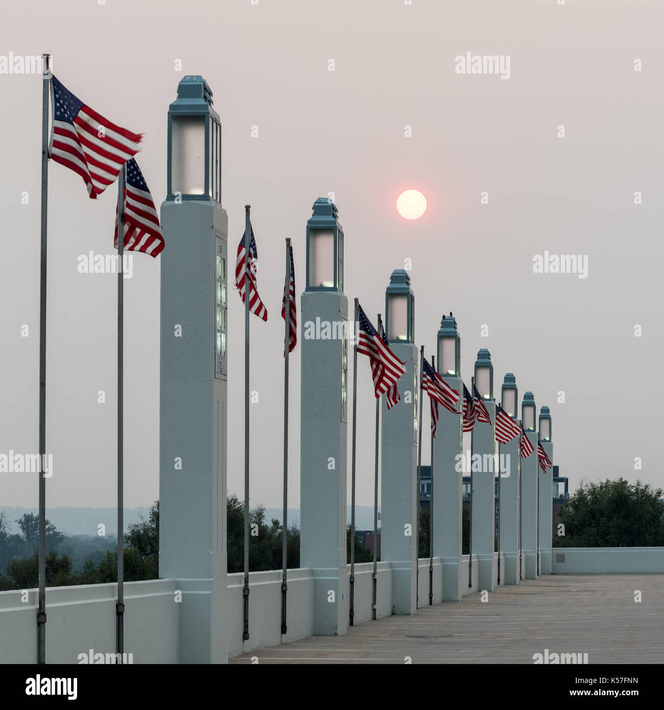 U.S. Flags and Light Columns at Sunrise at Union Station in Omaha ...