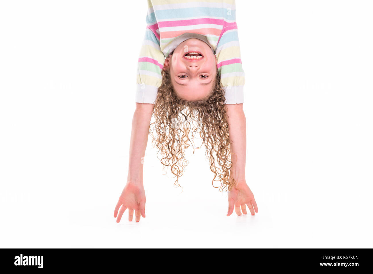 Portrait Of Happy Smiling Confident 9 Years Old Girl With Curly Hair