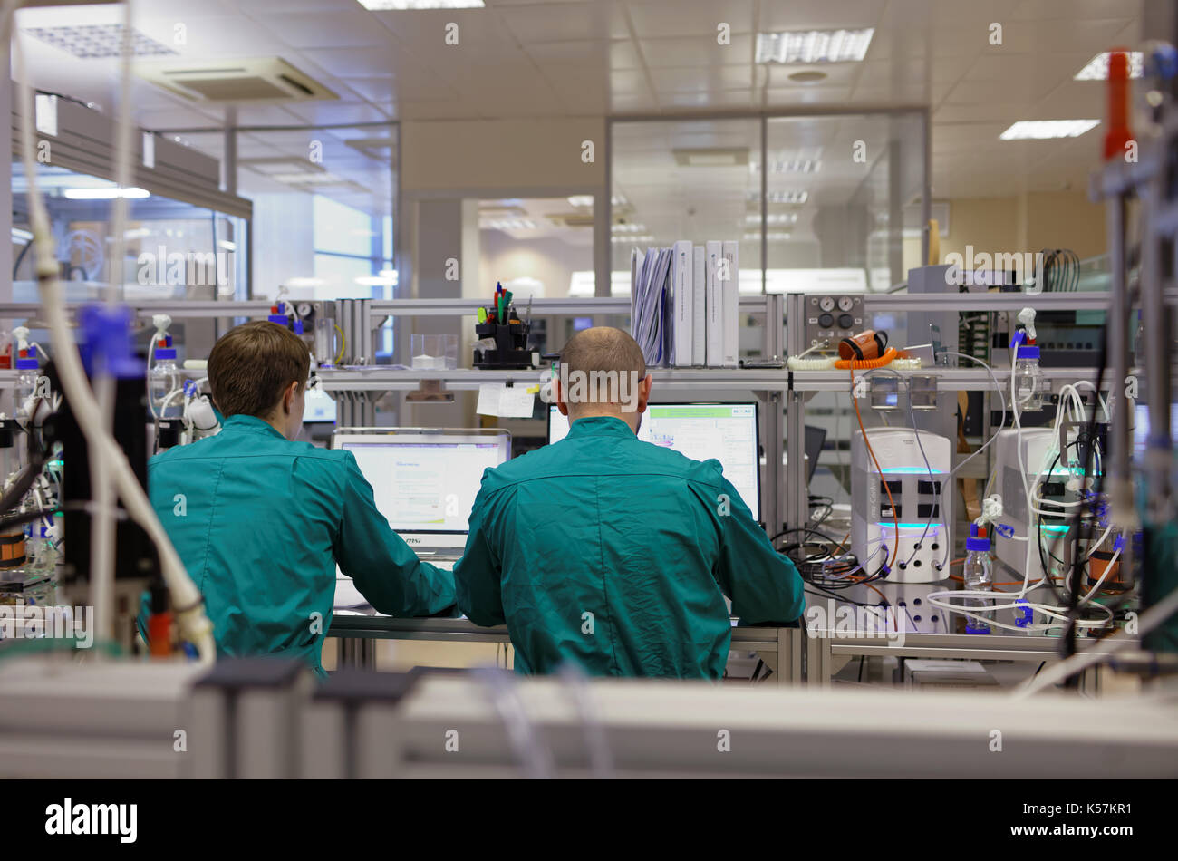 Researchers at work in the High-Throughput Biotechnology Laboratory of ...