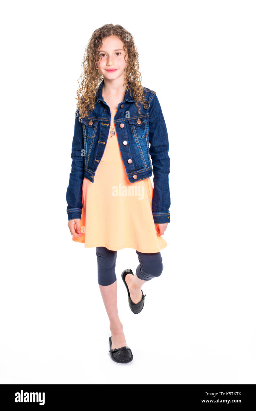 Portrait Of Happy Smiling Confident 9 Years Old Girl With Curly Hair