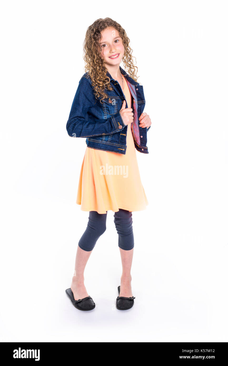 Portrait Of Happy Smiling Confident 9 Years Old Girl With Curly Hair