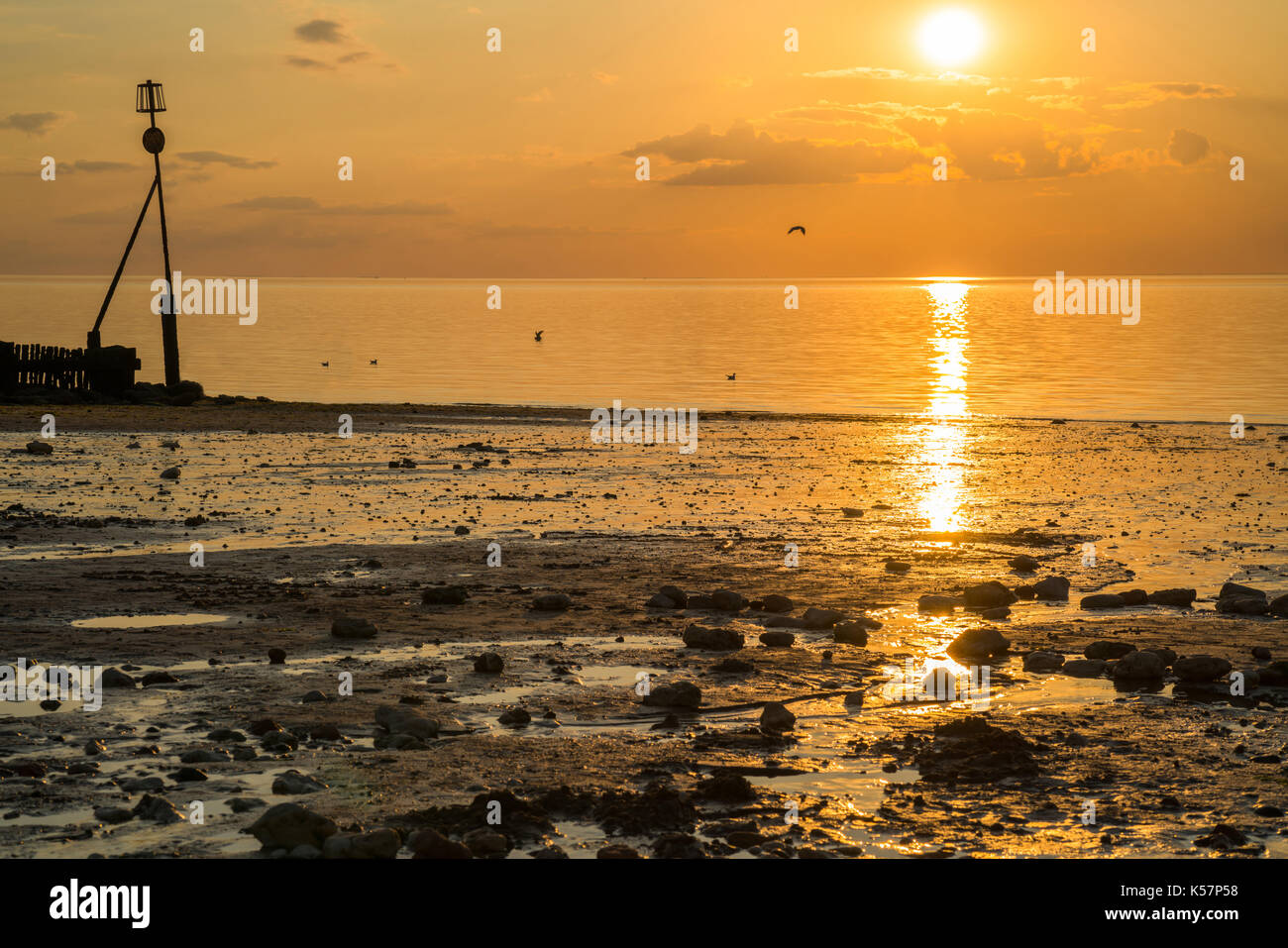 Beautiful sunset on the beach in Hunstanton, Norfolk, UK Stock Photo ...
