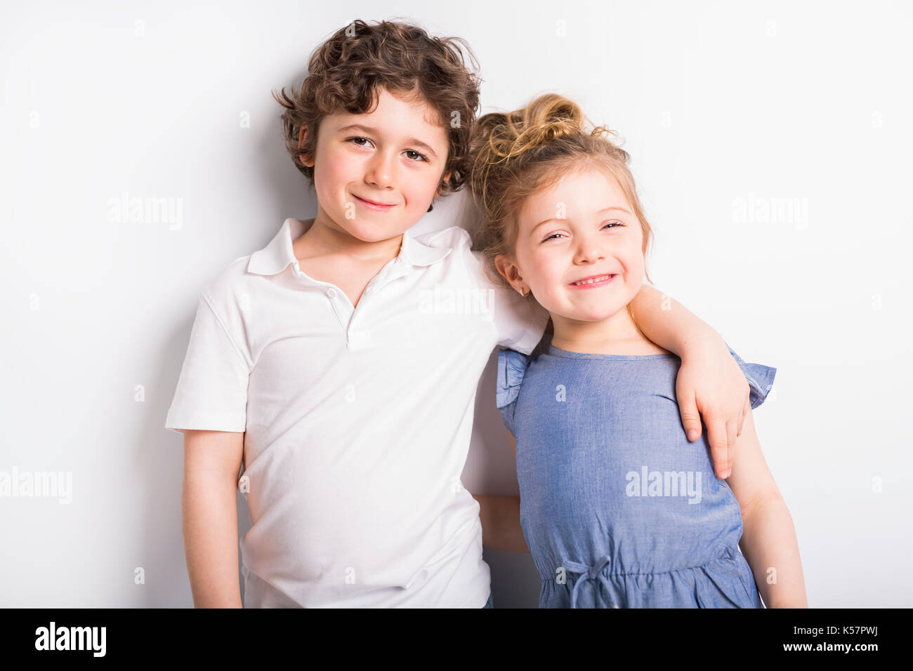 Happy Brother and Sister Hugging each other Stock Photo - Alamy