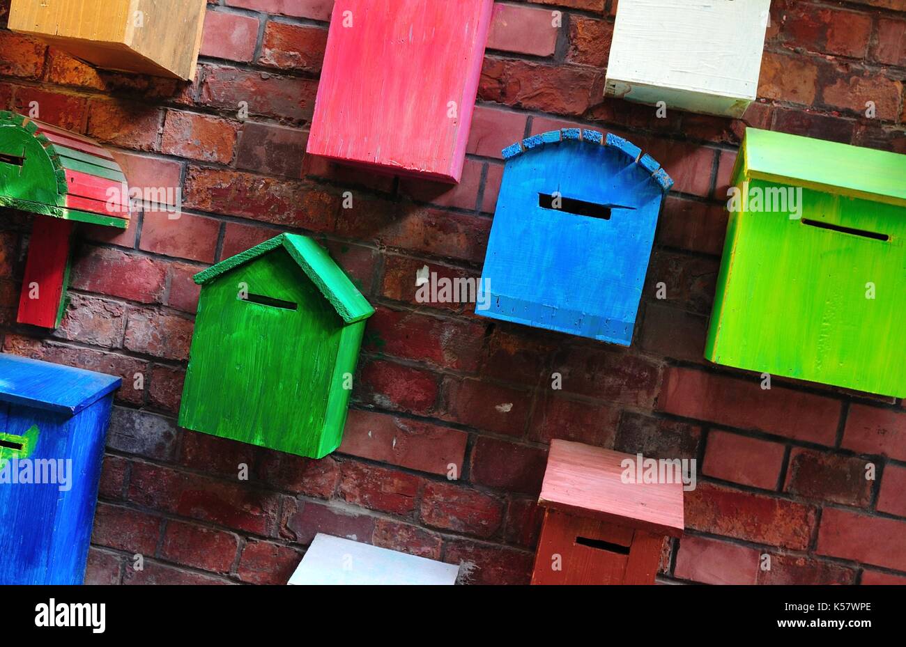 Colorful mail boxes on the red brick wall, Old Shanghai, China Stock ...